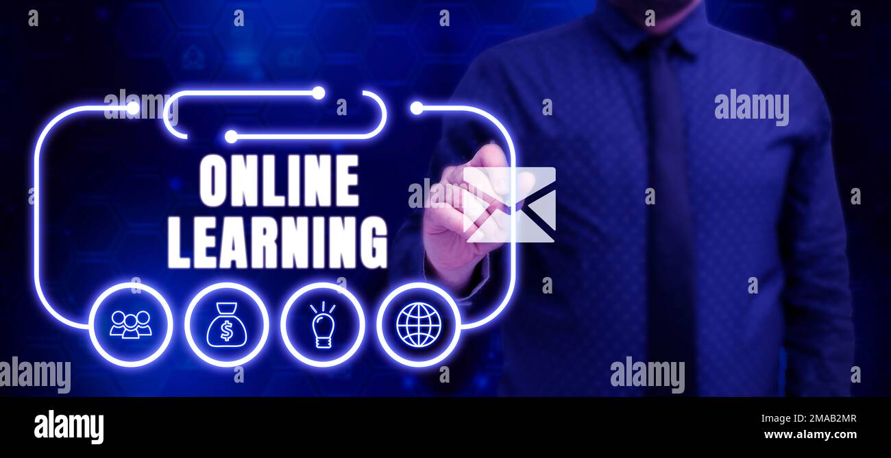 Hand writing sign Online Learning. Business concept Larning with the ...