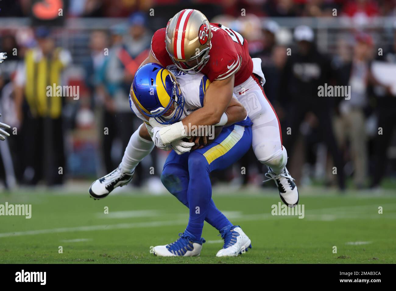 San Francisco 49ers defensive end Nick Bosa, top, sacks Los Angeles ...