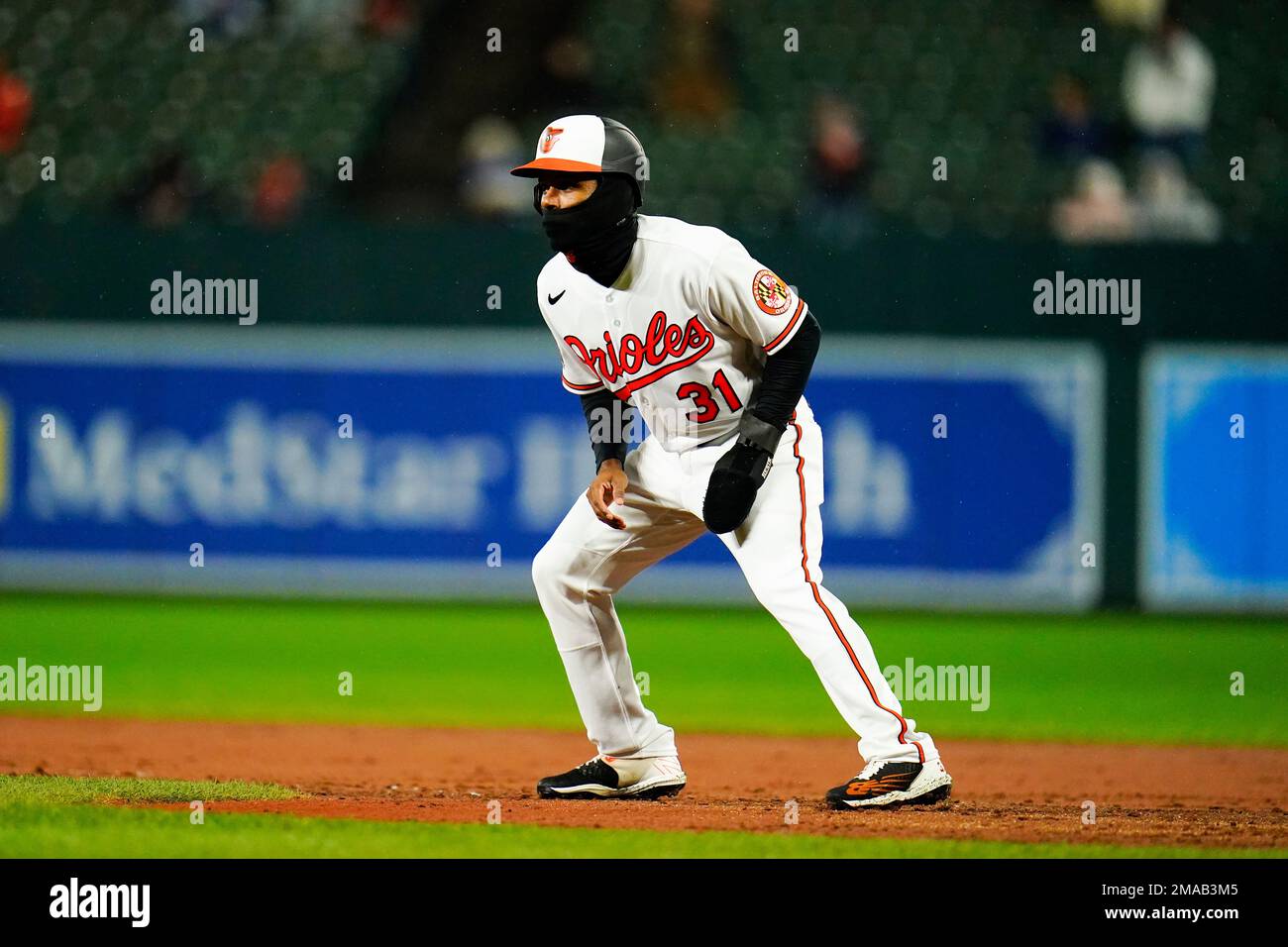 Baltimore Orioles' Cedric Mullins leads off from first base during the ...