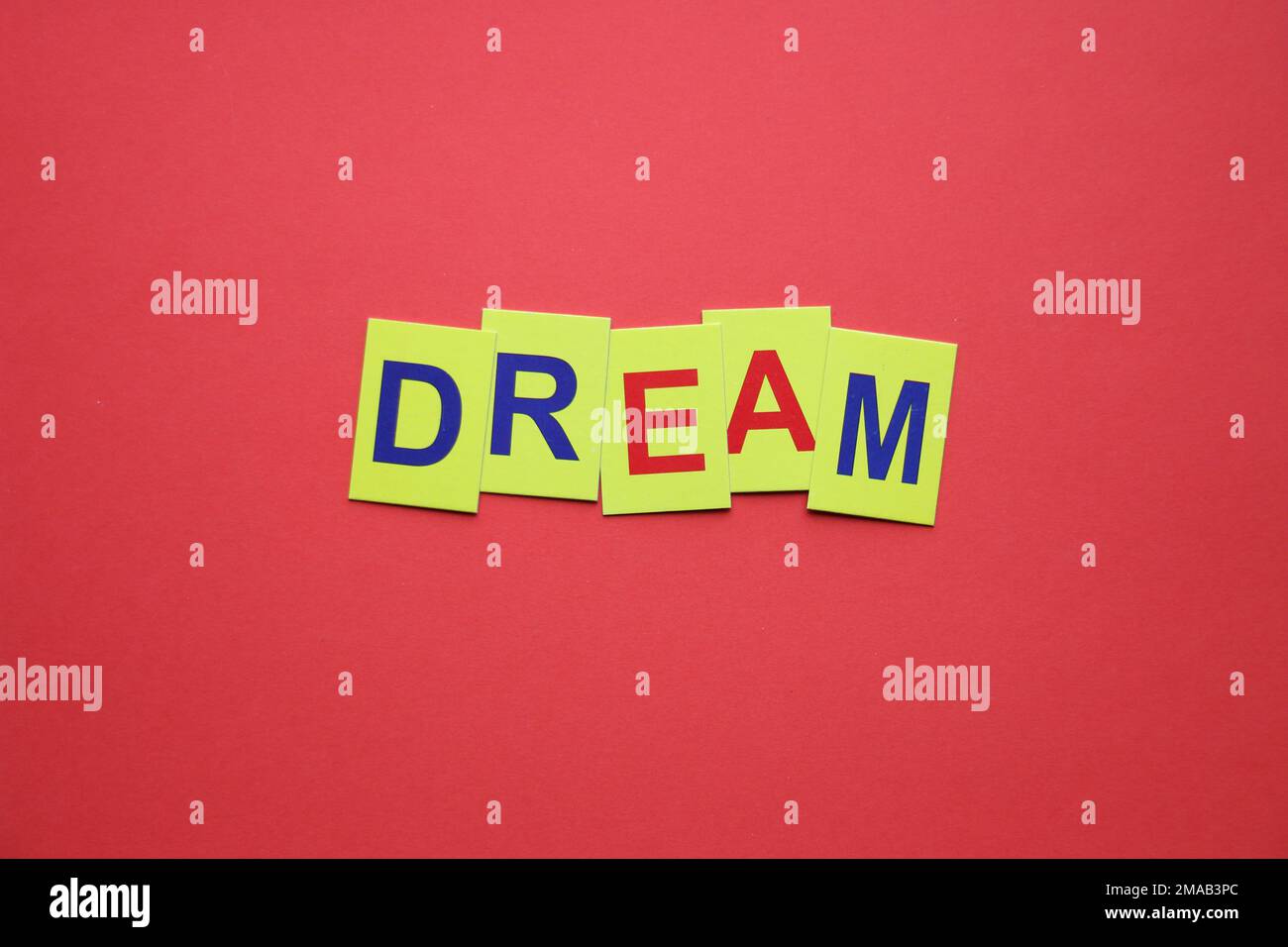 Dream creative concept. Inscription in yellow letters Stock Photo - Alamy