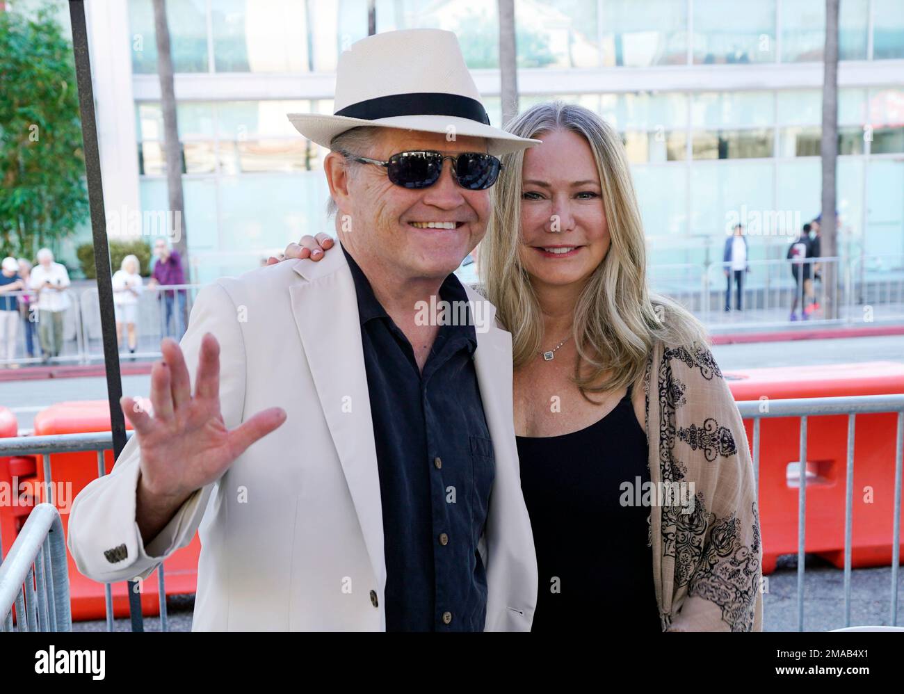 Micky Dolenz and his wife Donna Quinter pose together before a ...