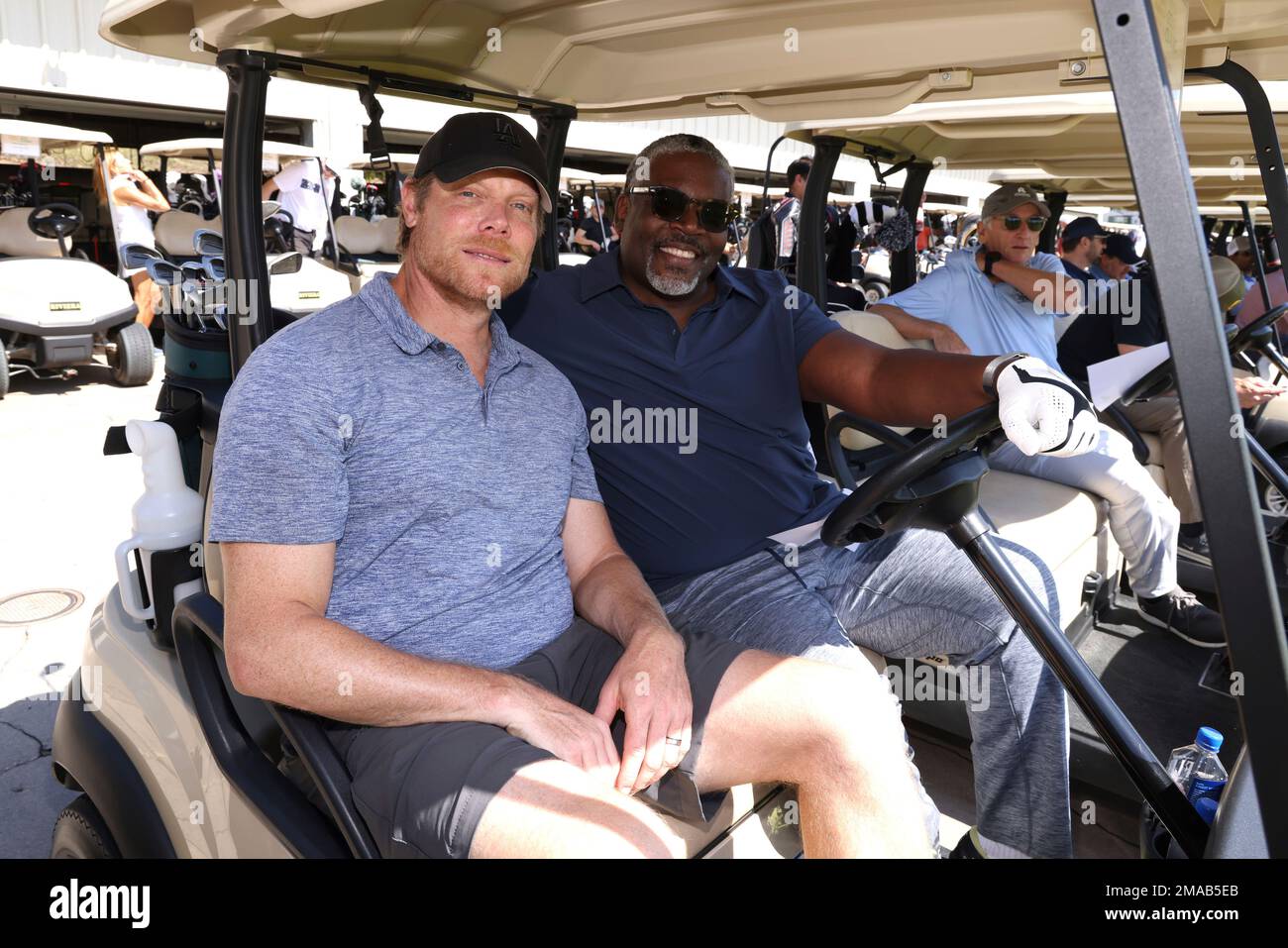 Brian Letscher, left, and Jonathan Adams attend the 2022 Emmys Golf ...