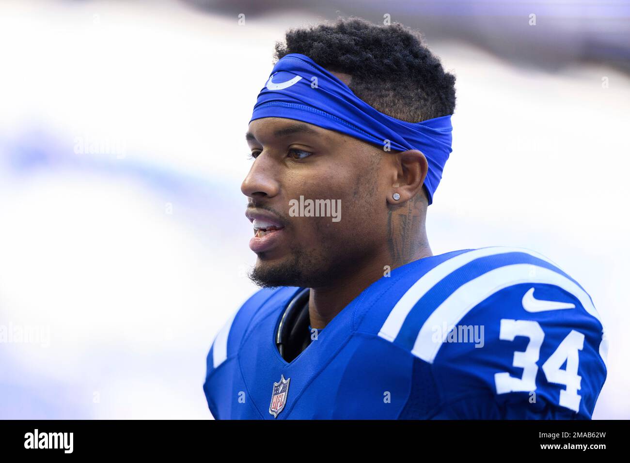 Indianapolis Colts cornerback Isaiah Rodgers (34) warms up on the field ...