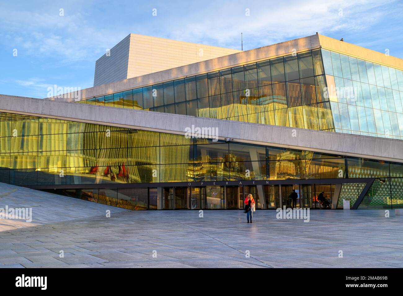 The modern Oslo Opera House with main entrance in Bjorvika, Oslo ...