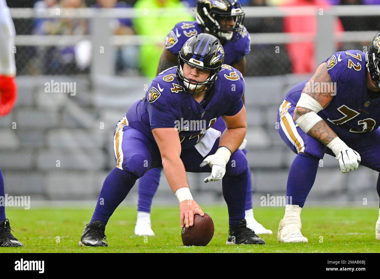 Baltimore Ravens center Tyler Linderbaum (64) gets in position during ...