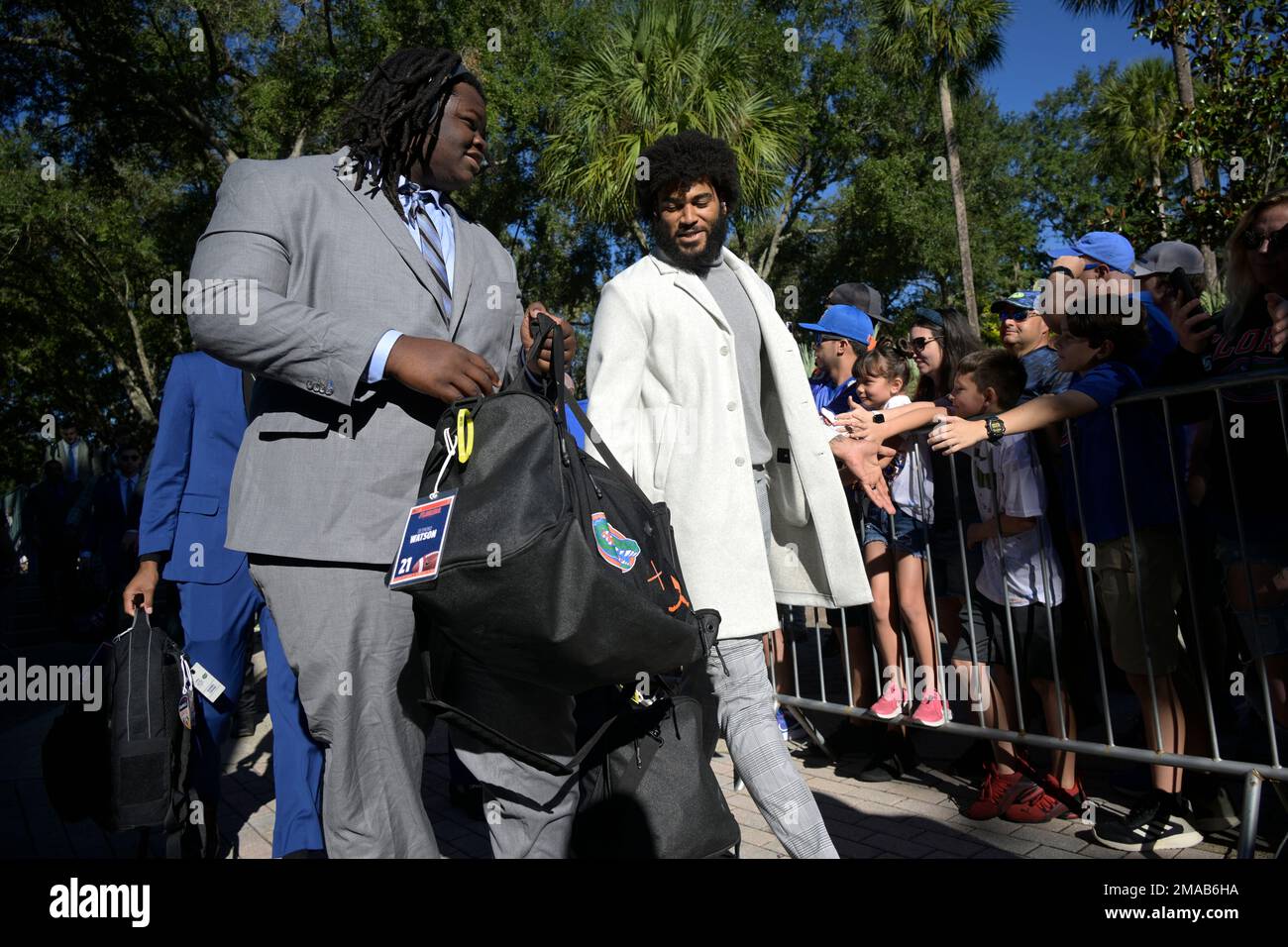 Florida defensive lineman Desmond Watson (21) walks into the stadium ...