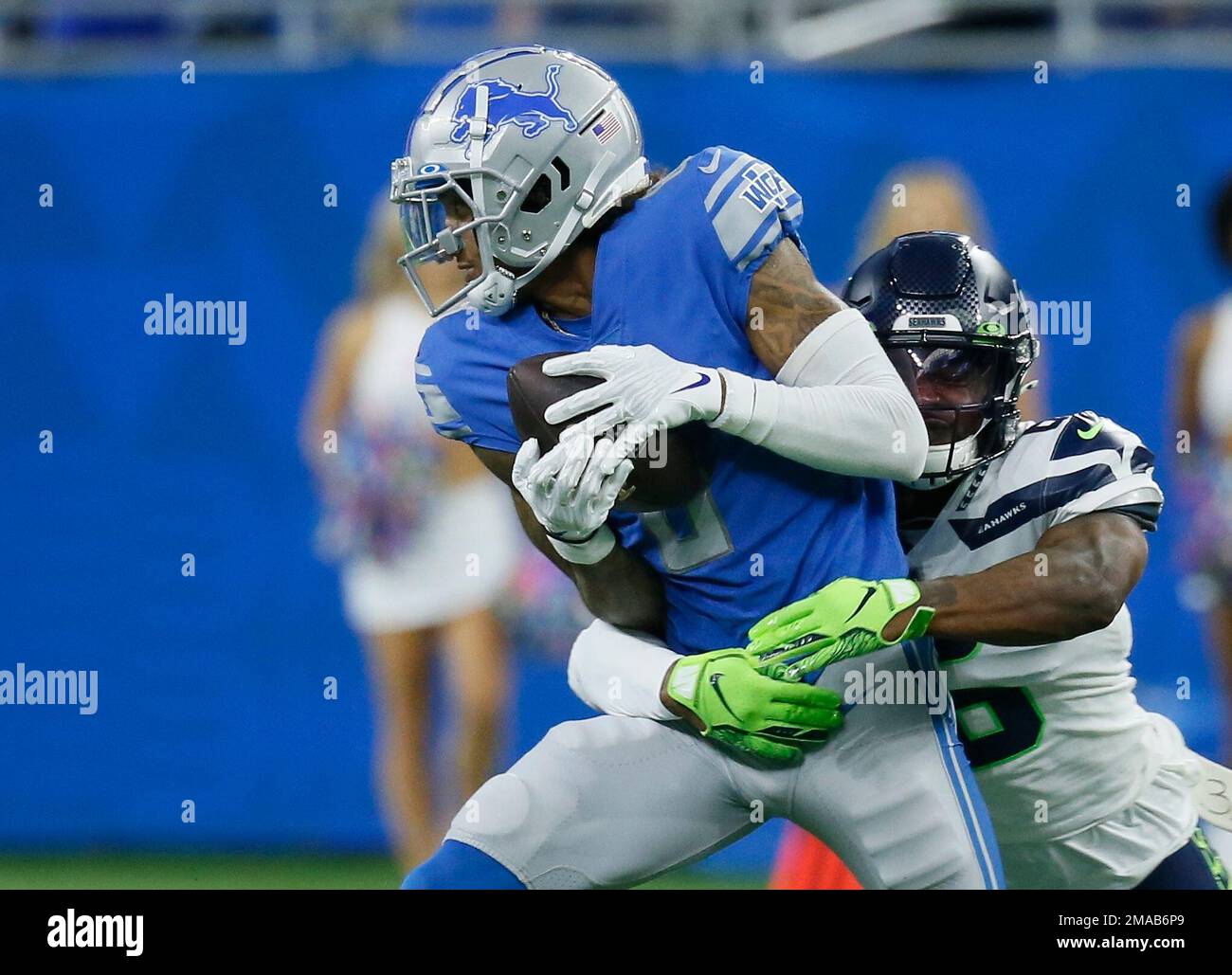 Detroit Lions wide receiver Josh Reynolds is tackled by Seattle Seahawks safety Quandre Diggs ...