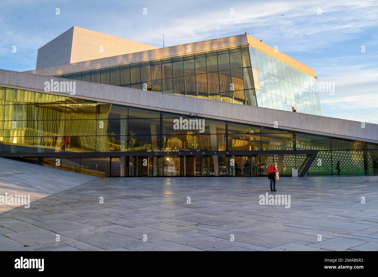 The modern Oslo Opera House with main entrance in Bjorvika, Oslo ...