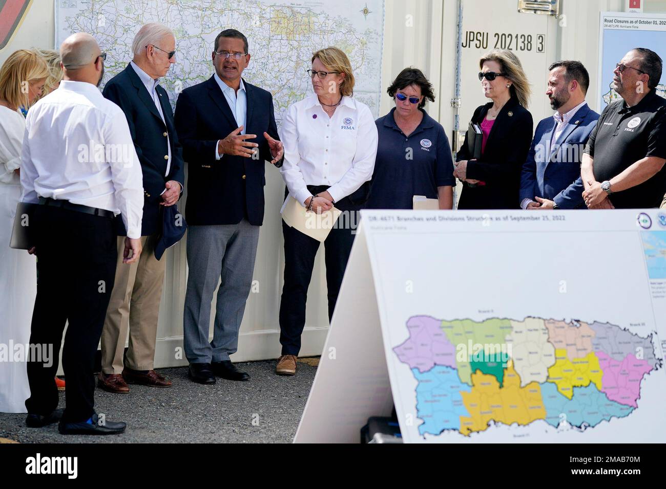 President Joe Biden receives a briefing from Puerto Rico Gov. Pedro ...