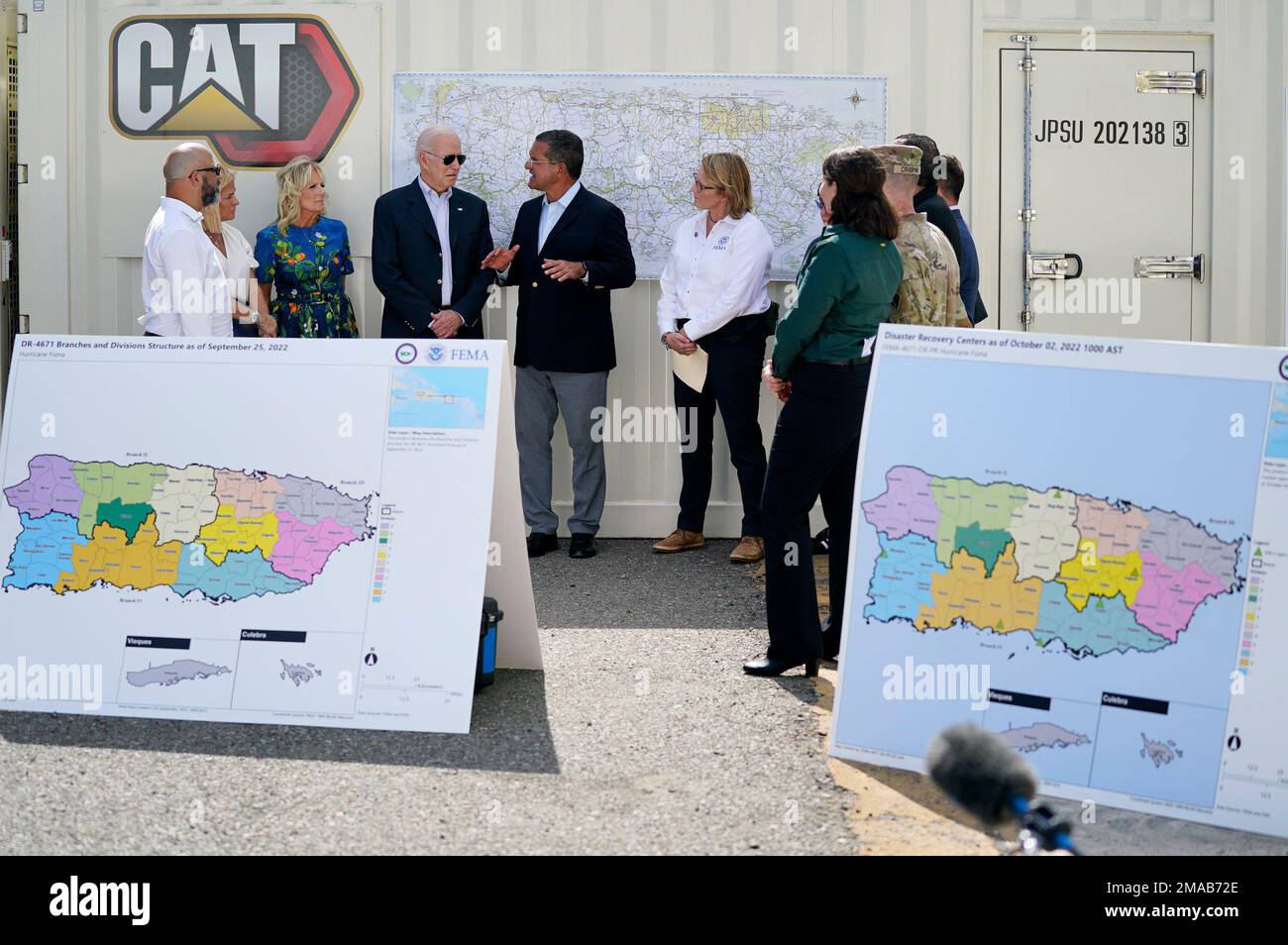 President Joe Biden and first lady Jill Biden, receive a briefing from ...