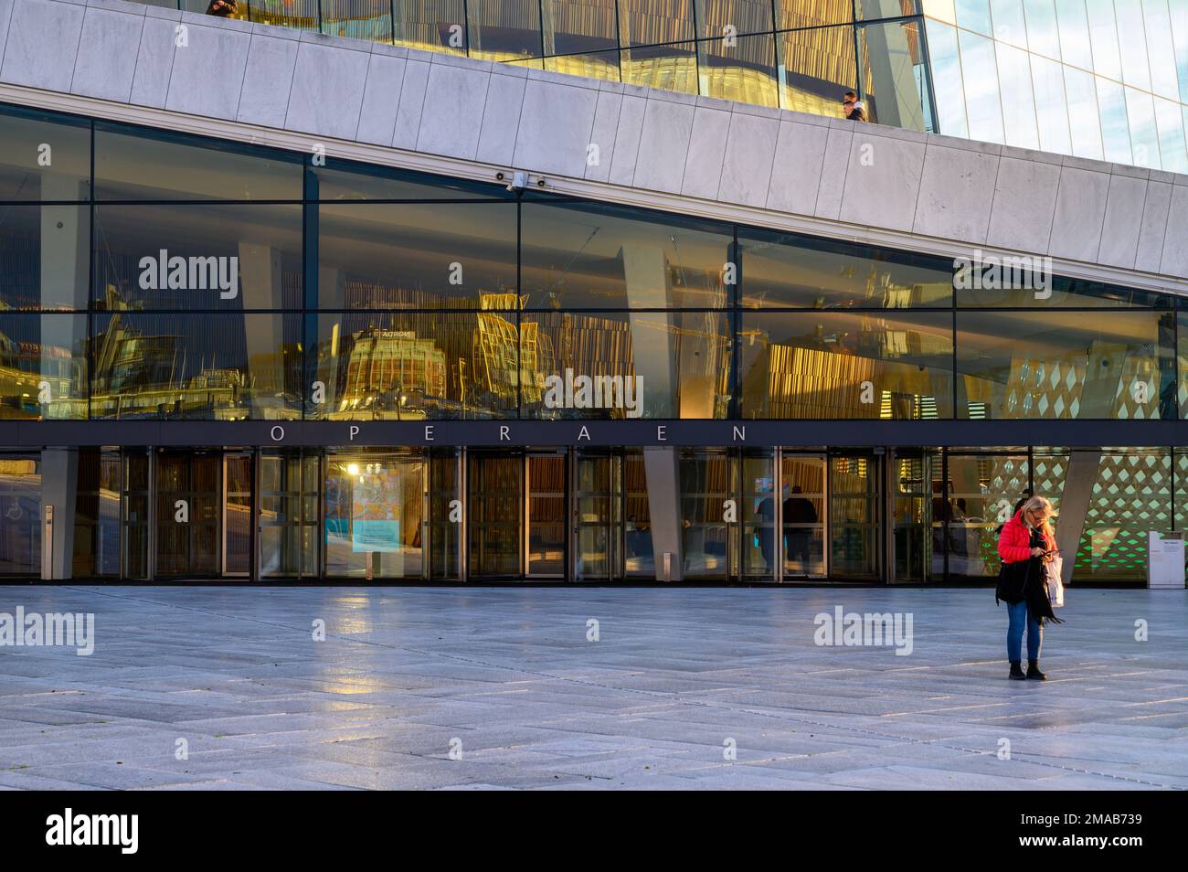 The modern Oslo Opera House with main entrance in Bjorvika, Oslo ...