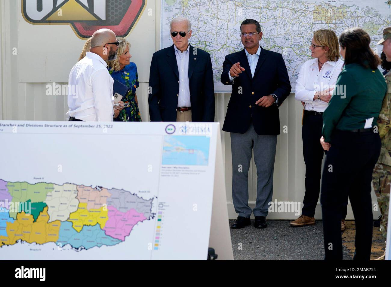 President Joe Biden receives a briefing from Puerto Rico Gov. Pedro ...