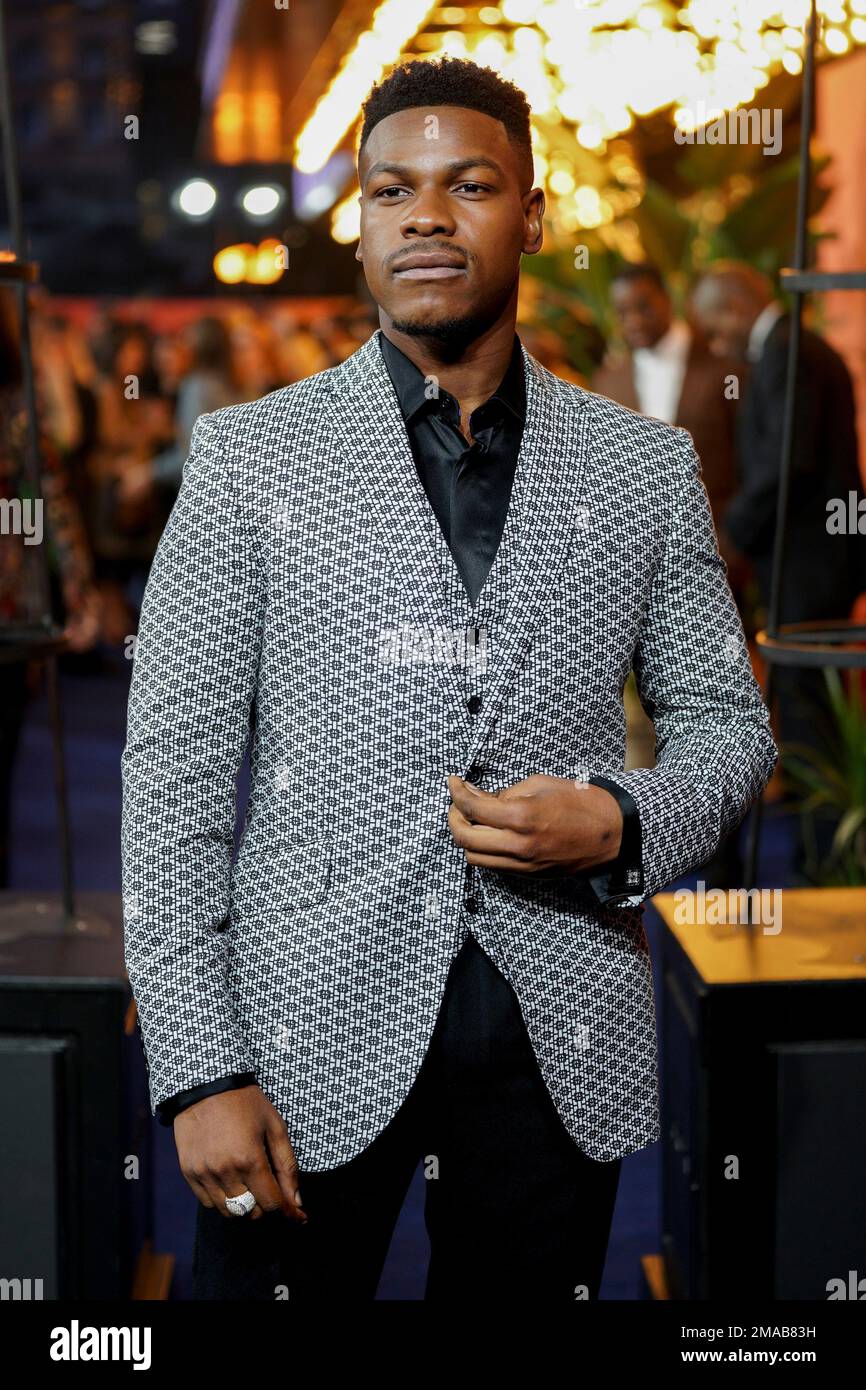 John Boyega poses for photographers upon arrival for the UK Gala ...