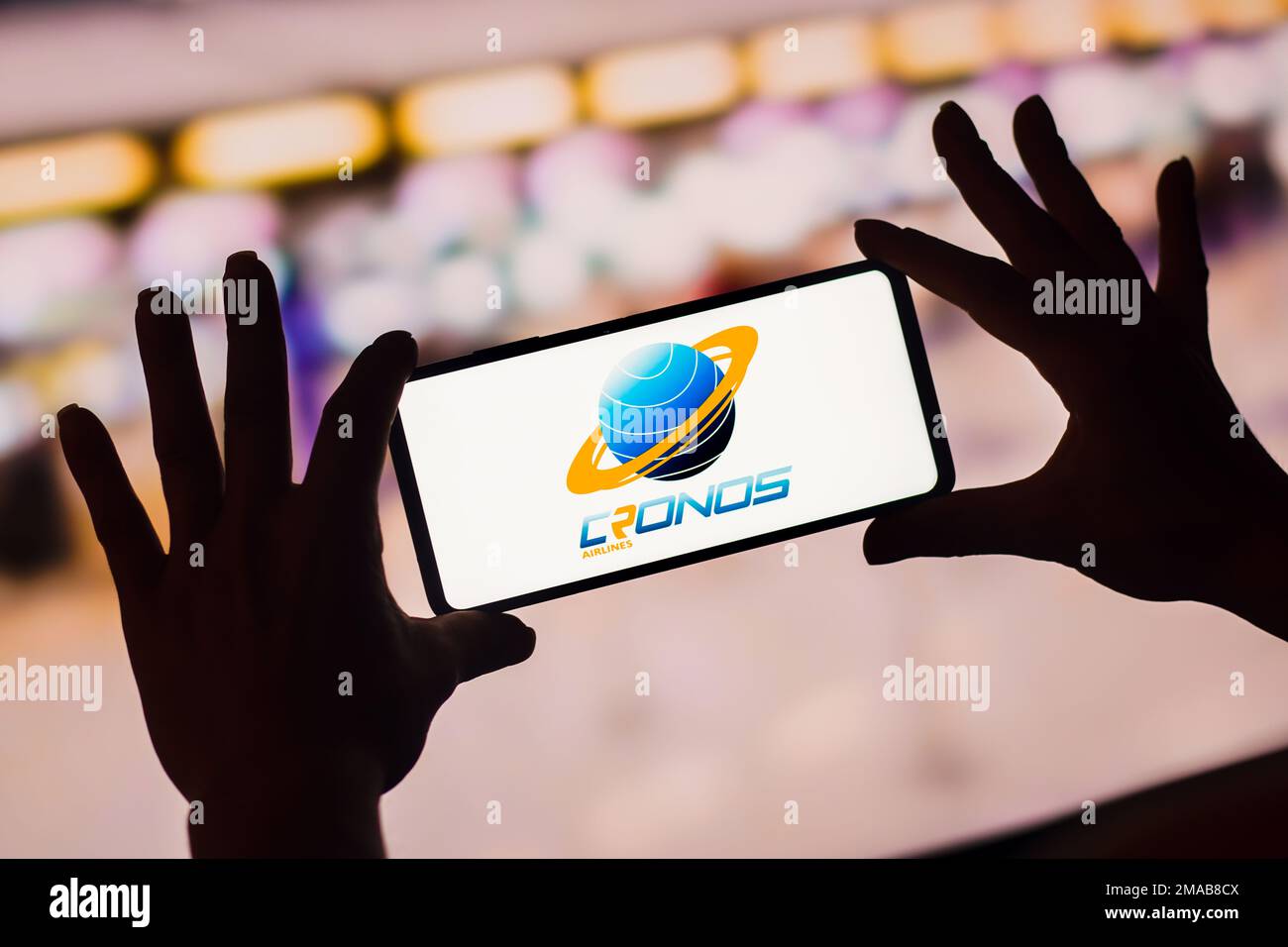 In this photo illustration, the Cronos Airlines logo is displayed on a ...