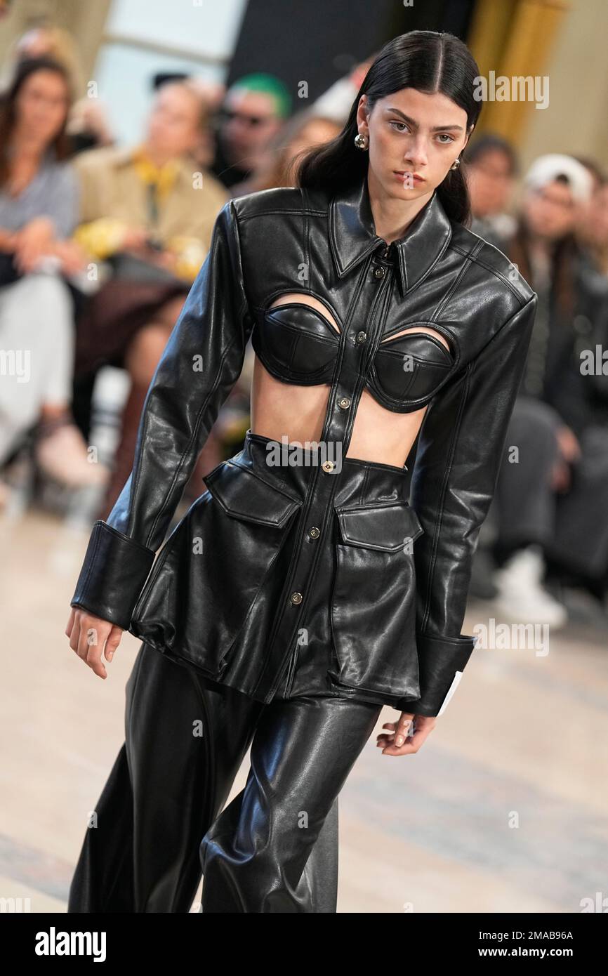 A model wears a creation for Rokh's ready-to-wear Spring/Summer 2023 ...