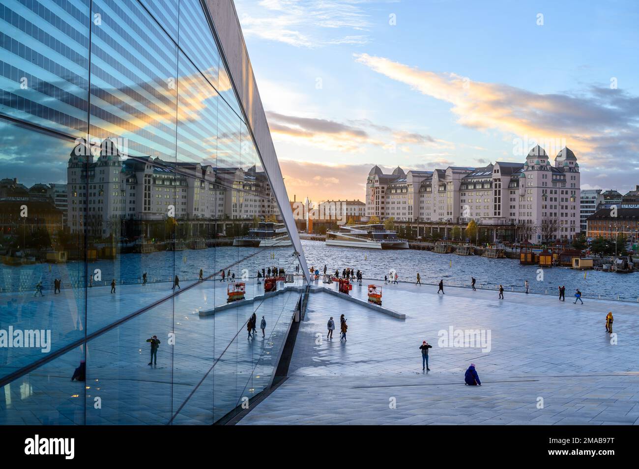 Glass facade detail of the modern Oslo Opera House with Havnelageret ...