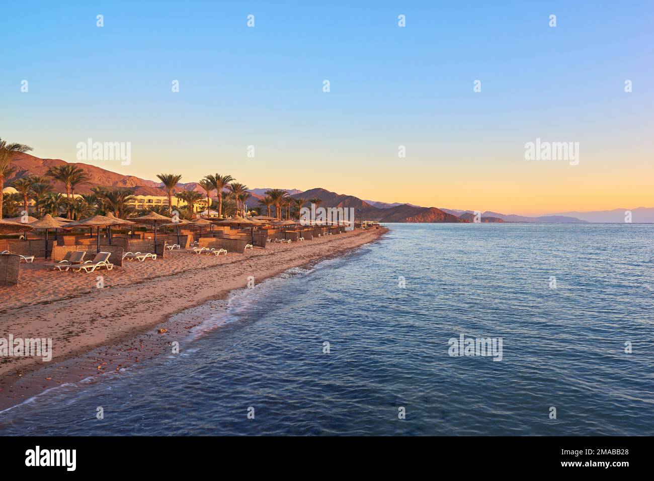 Sunrise on a red sea beach in Taba, Egypt Stock Photo - Alamy