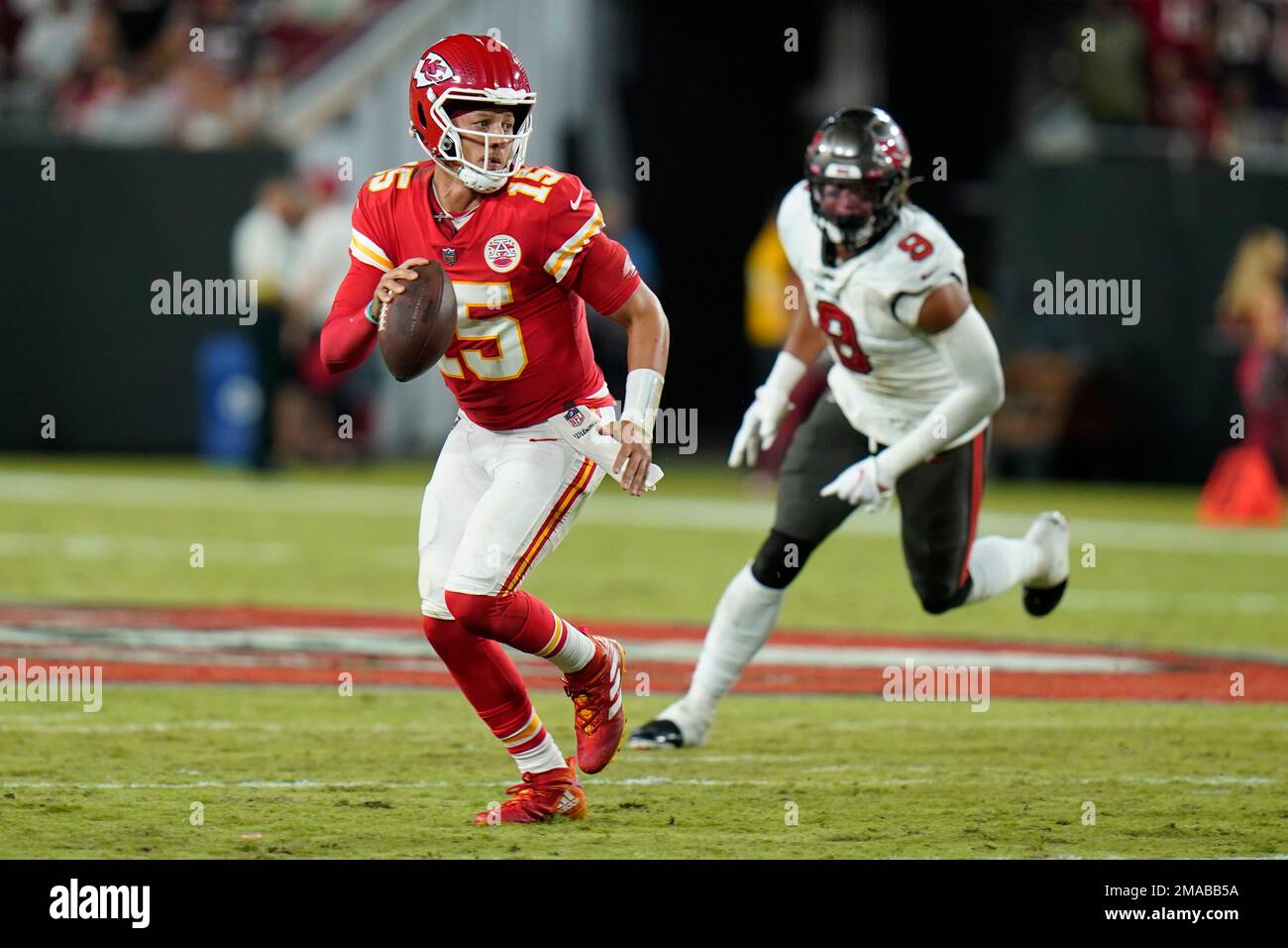 Kansas City Chiefs quarterback Patrick Mahomes (15) outruns Tampa Bay ...