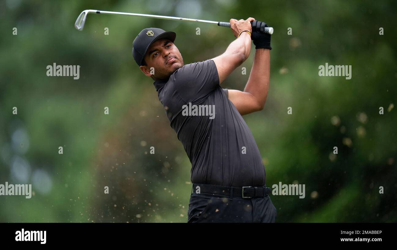 Sebastian Munoz, of Colombia, hits from the sixth tee during their ...