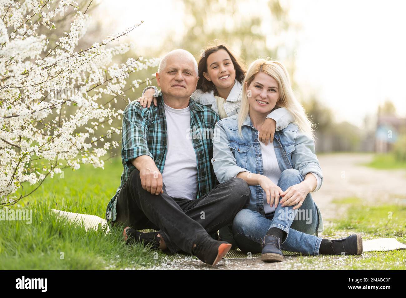 Old grandmother sitting in flower hi-res stock photography and images ...