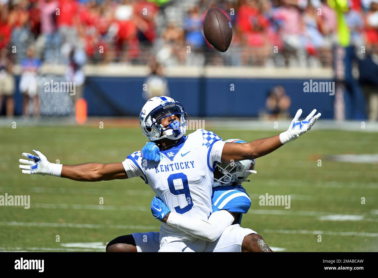 Mississippi safety AJ Finley (21) tackles Kentucky wide receiver ...