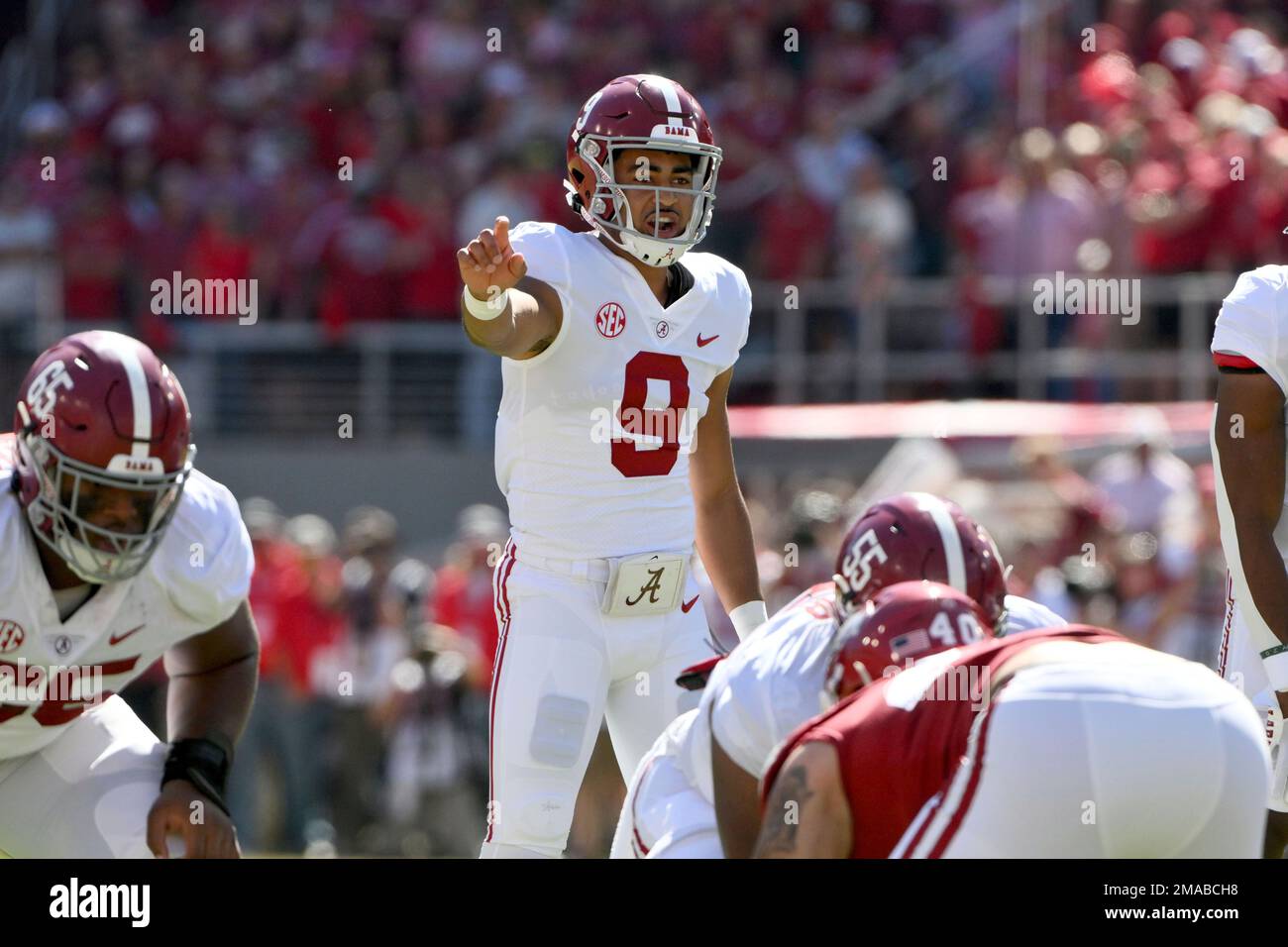 Alabama quarterback Bryce Young (9) runs a play against Arkansas during ...