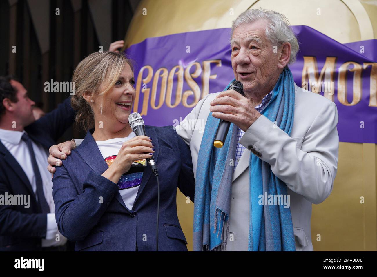 Mel Giedroyc, left, and Sir Ian McKellen pose for photographers during ...