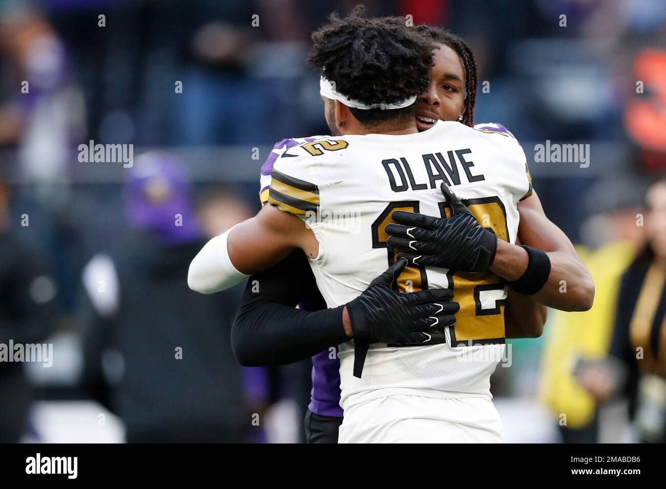 Minnesota Vikings wide receiver Justin Jefferson (18) hugs New Orleans ...