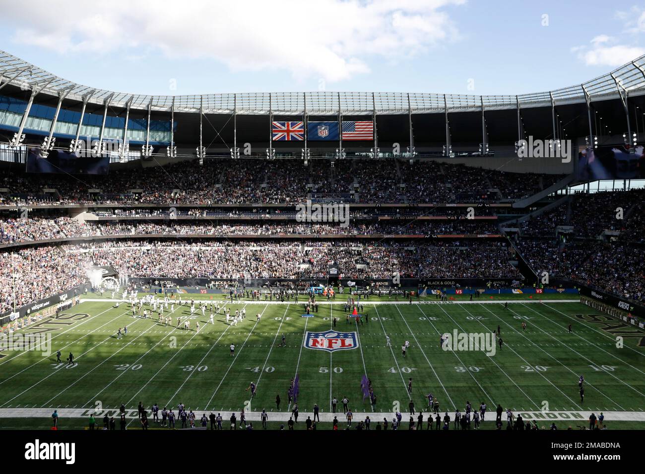 The New Orleans Saints take the field before an NFL football game ...