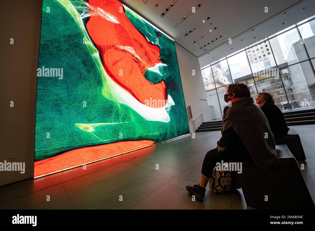 Visitors view artist Refik Anadol's "Unsupervised" exhibit at the ...