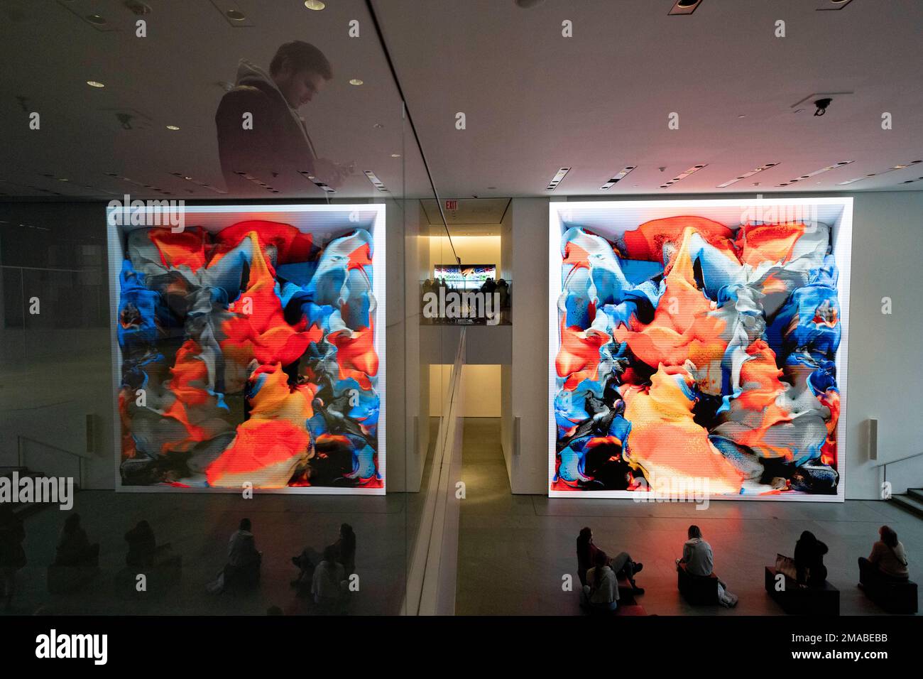 Visitors view artist Refik Anadol's "Unsupervised" exhibit at the ...