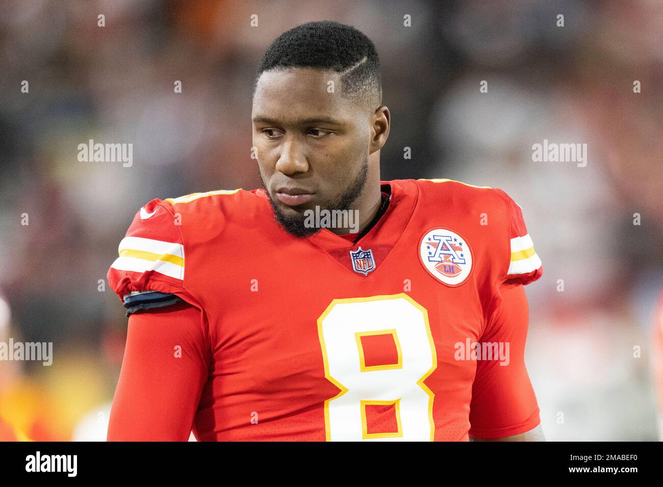 Kansas City Chiefs defensive end Carlos Dunlap (8) walks the bench ...