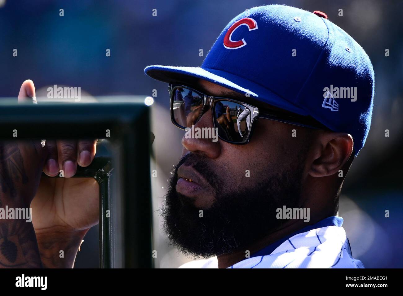 Chicago Cubs' Jason Heyward looks on from the dugout during the team's ...
