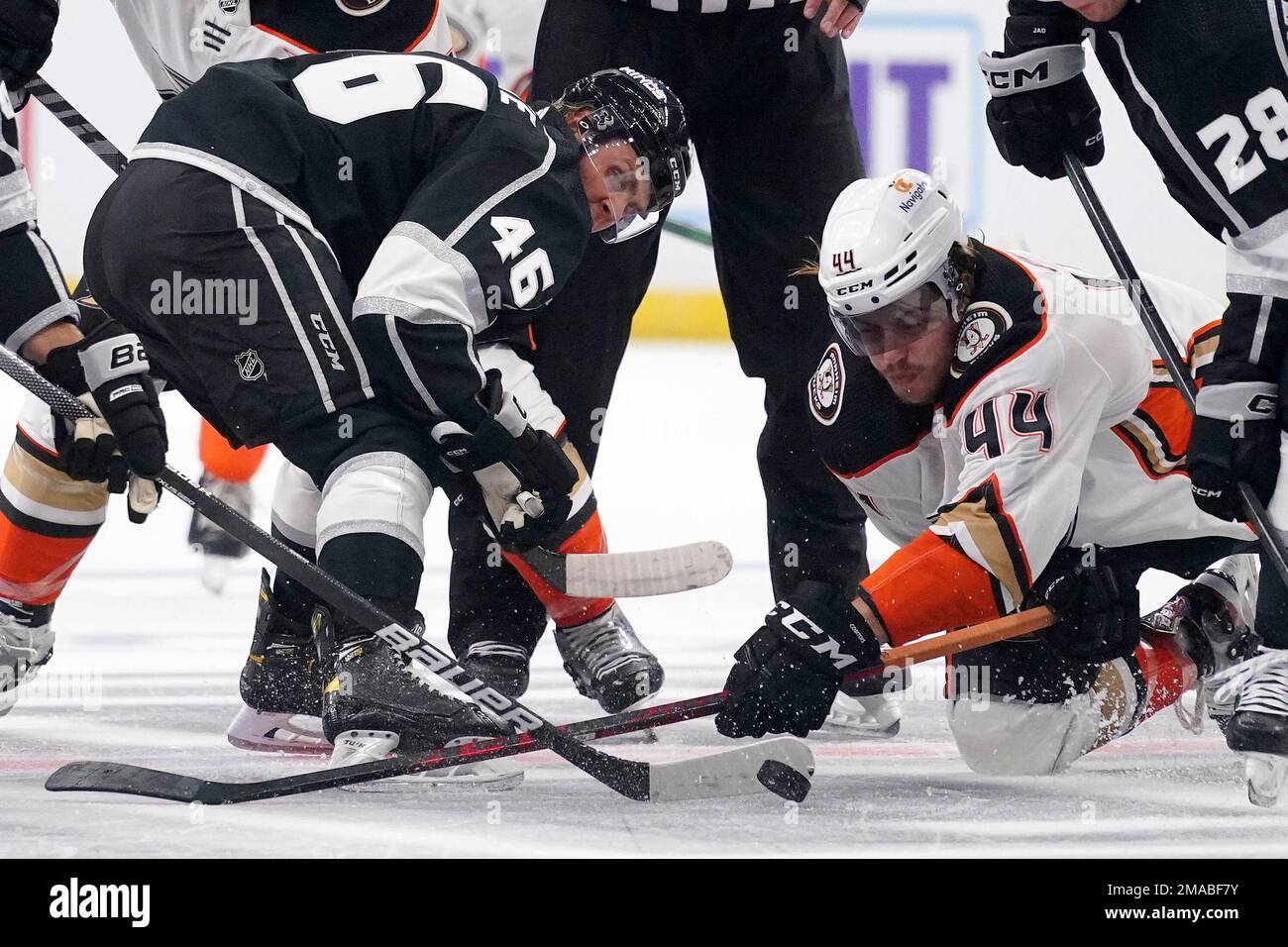 Los Angeles Kings center Blake Lizotte, left, and Anaheim Ducks left ...