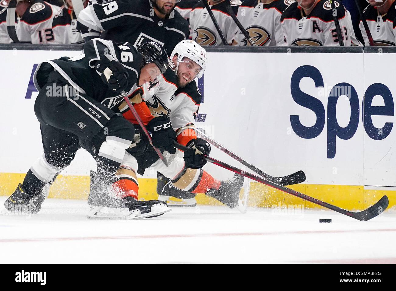 Los Angeles Kings center Blake Lizotte, left, and Anaheim Ducks center ...
