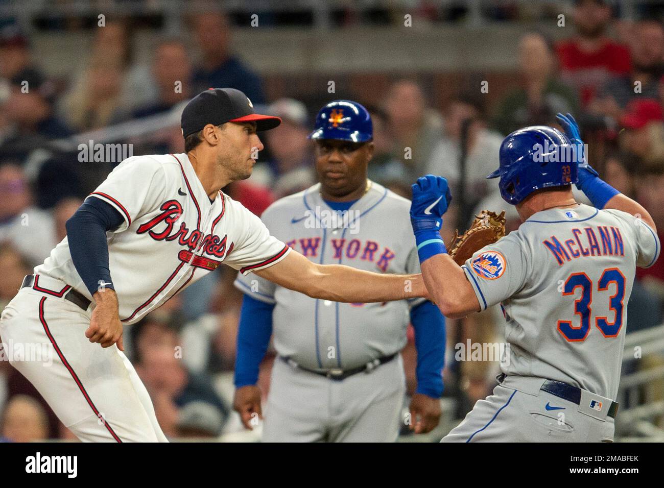 Atlanta Braves first baseman Matt Olson tags New York Mets James McCann ...