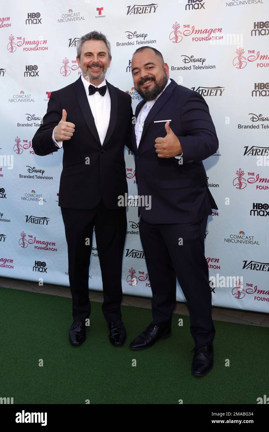 Jason Shuman, left, and Eduardo Cisneros arrive at the Imagen Awards on ...