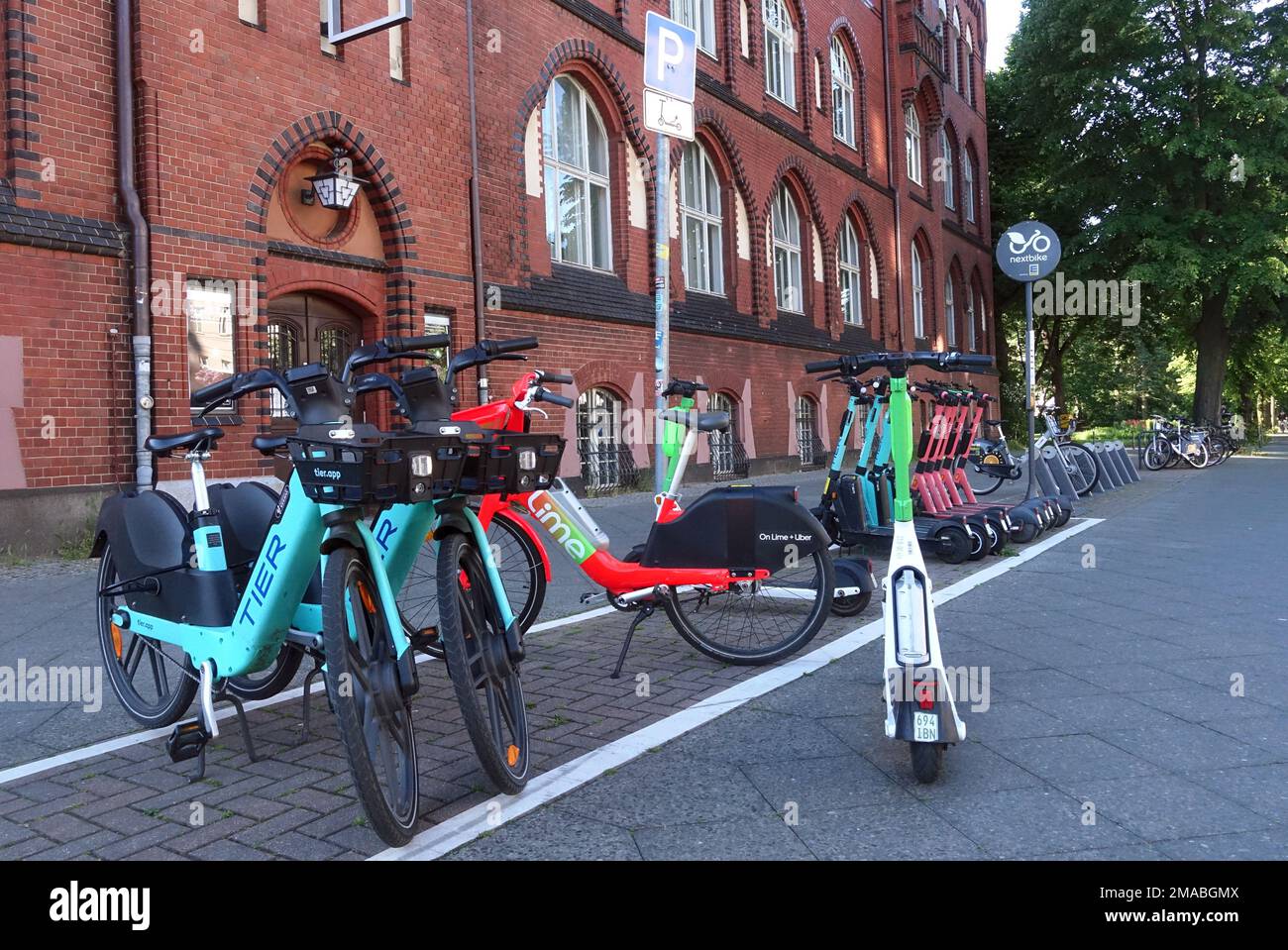 03.06.2022, Germany, , Berlin - E-scooters of Voi, Tier and Lime ...