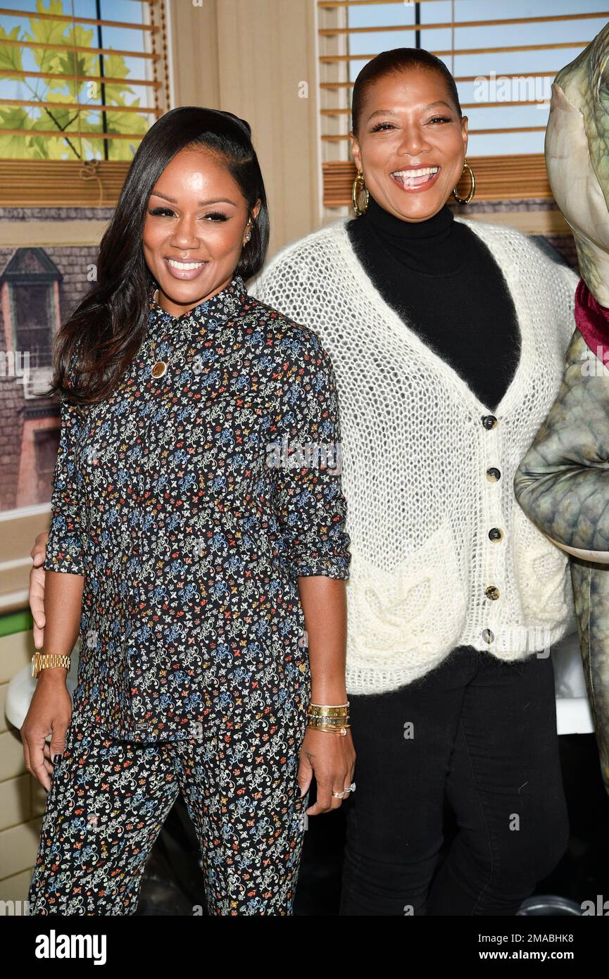 Eboni Nichols Left And Queen Latifah Attend The Premiere Of Lyle