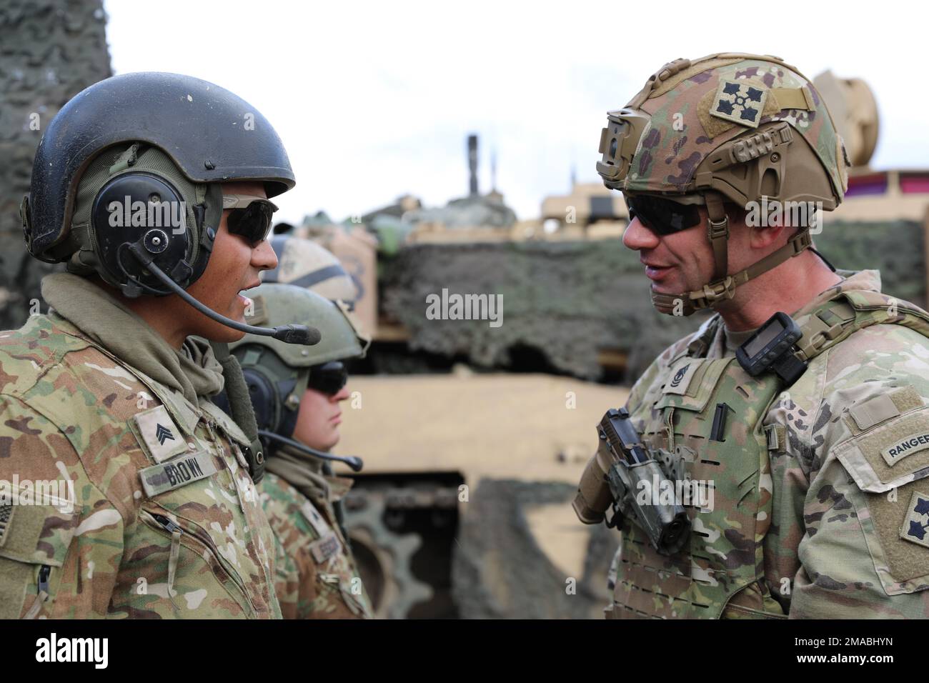 U.S. Army Sgt. Jesse Brown, left, commander of an M1A2 Abrams tank ...