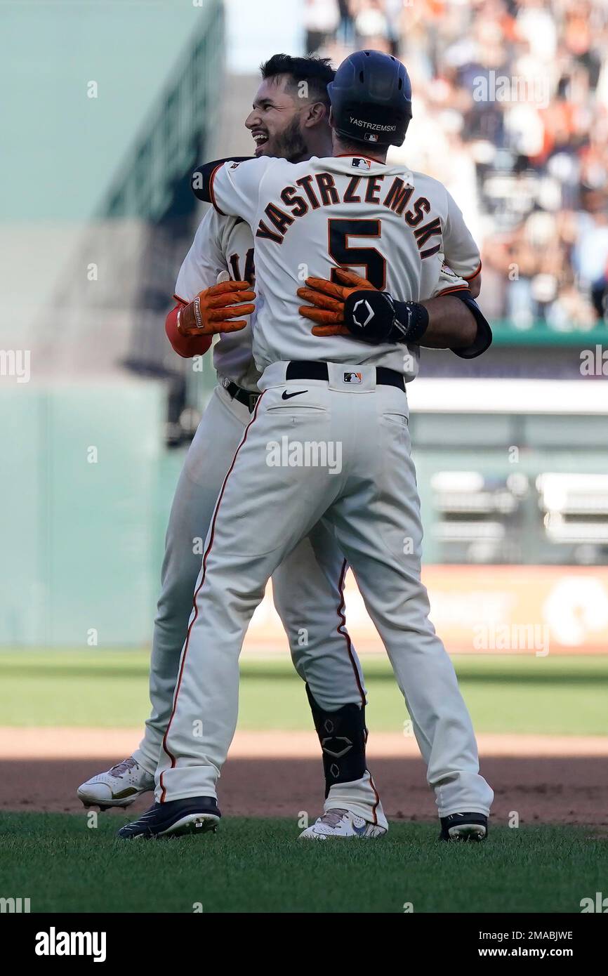 San Francisco Giants' David Villar, left, is congratulated by Mike ...