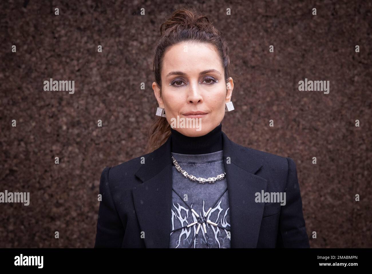 Noomi Rapace poses for photographers upon arrival for the Givenchy ...