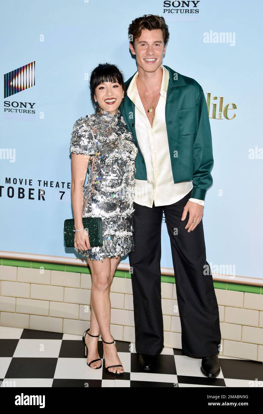 Constance Wu, left, and Shawn Mendes pose together at the premiere of ...