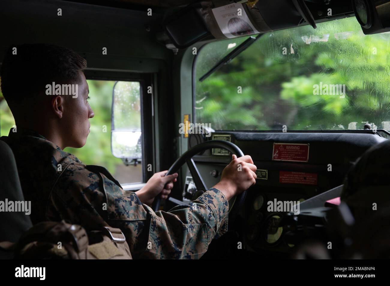 U.S. Marine Corps Lance Cpl. Alan Cruz, a motor vehicle operator with ...