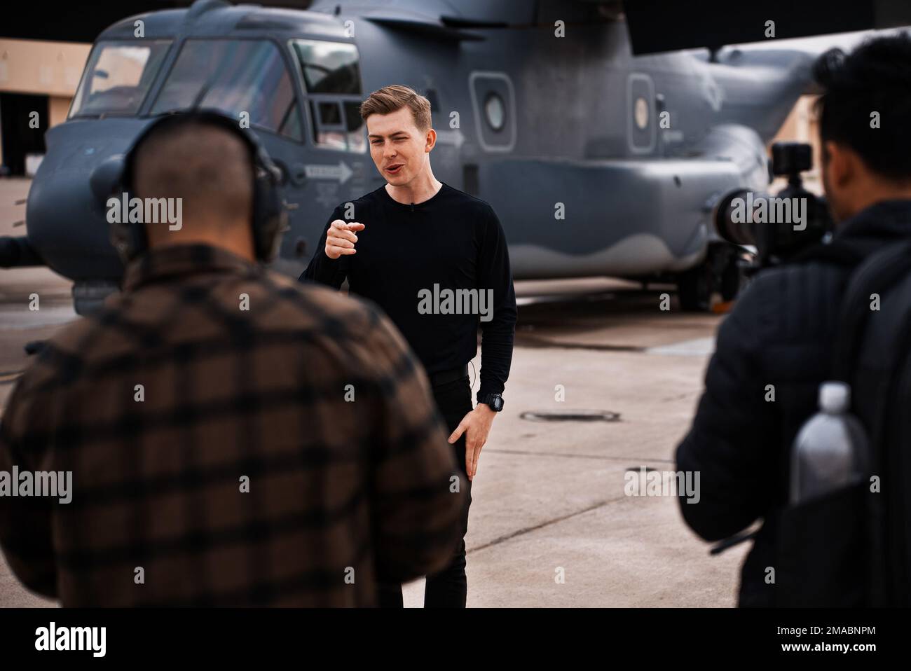 Sam Eckholm, multimedia content creator, records video narration in ...