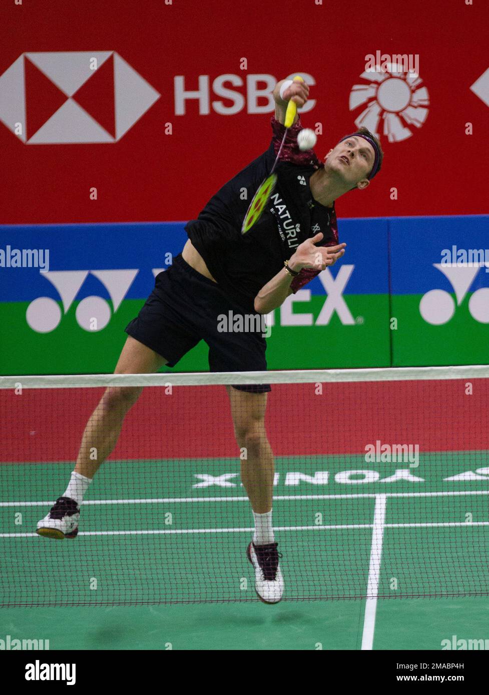 New Delhi, India. 19th Jan, 2023. Denmark's Viktor Axelsen competes ...