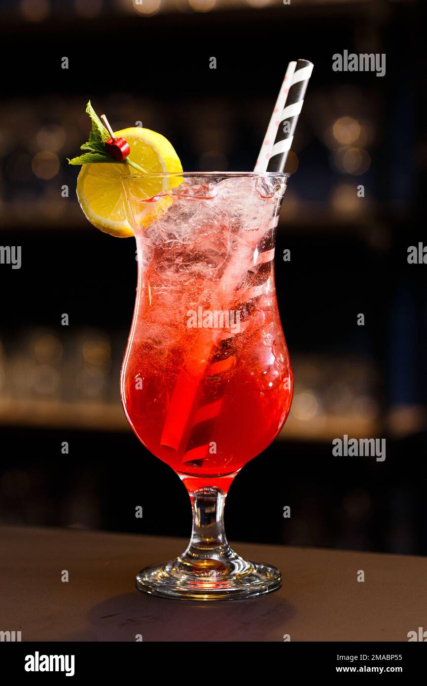 Cocktail Raspberry Cobbler with mint leaves on a dark background Stock ...