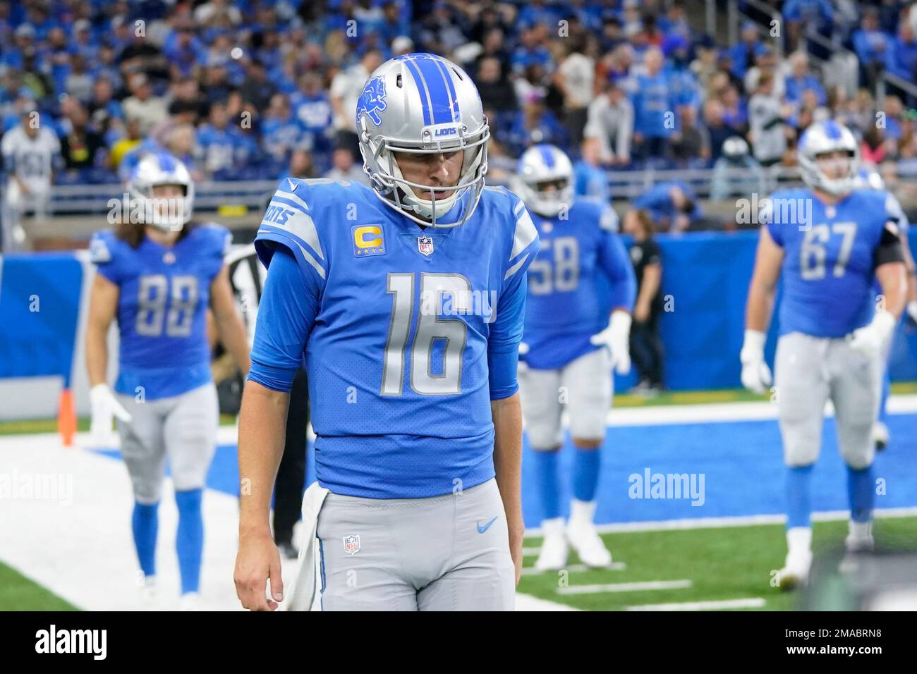 Detroit Lions quarterback Jared Goff (16) walks to the sideline after ...