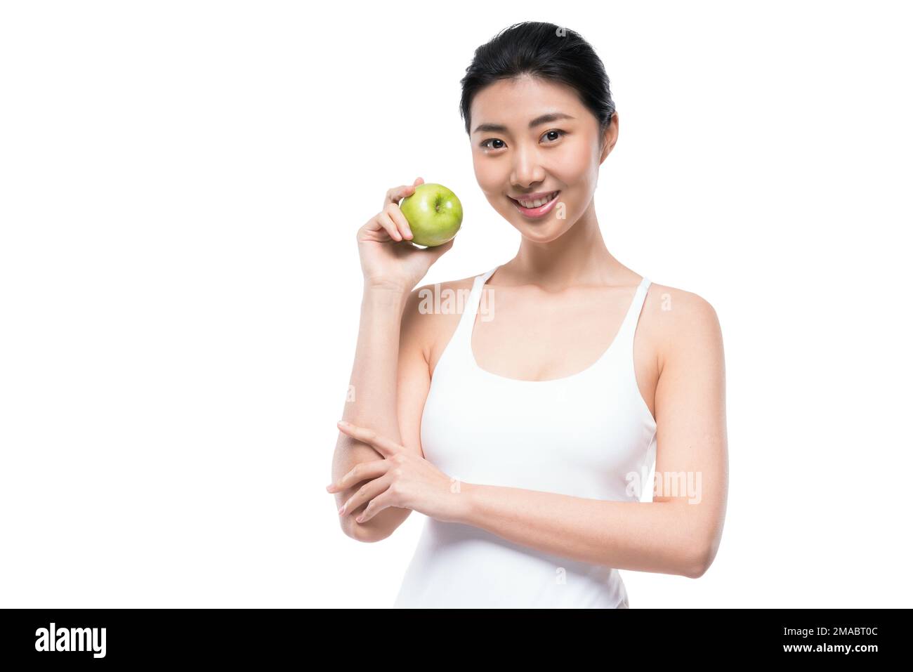 Young woman holding the apple Stock Photo - Alamy