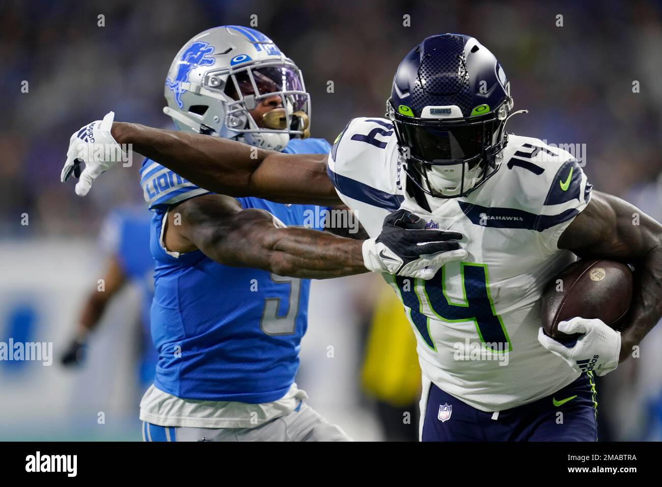 Seattle Seahawks wide receiver DK Metcalf (14) pushes Detroit Lions ...